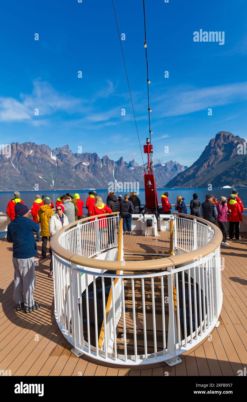 Tourists on deck of Hurtigruten MS Fridtjof Nansen cruise ship ...