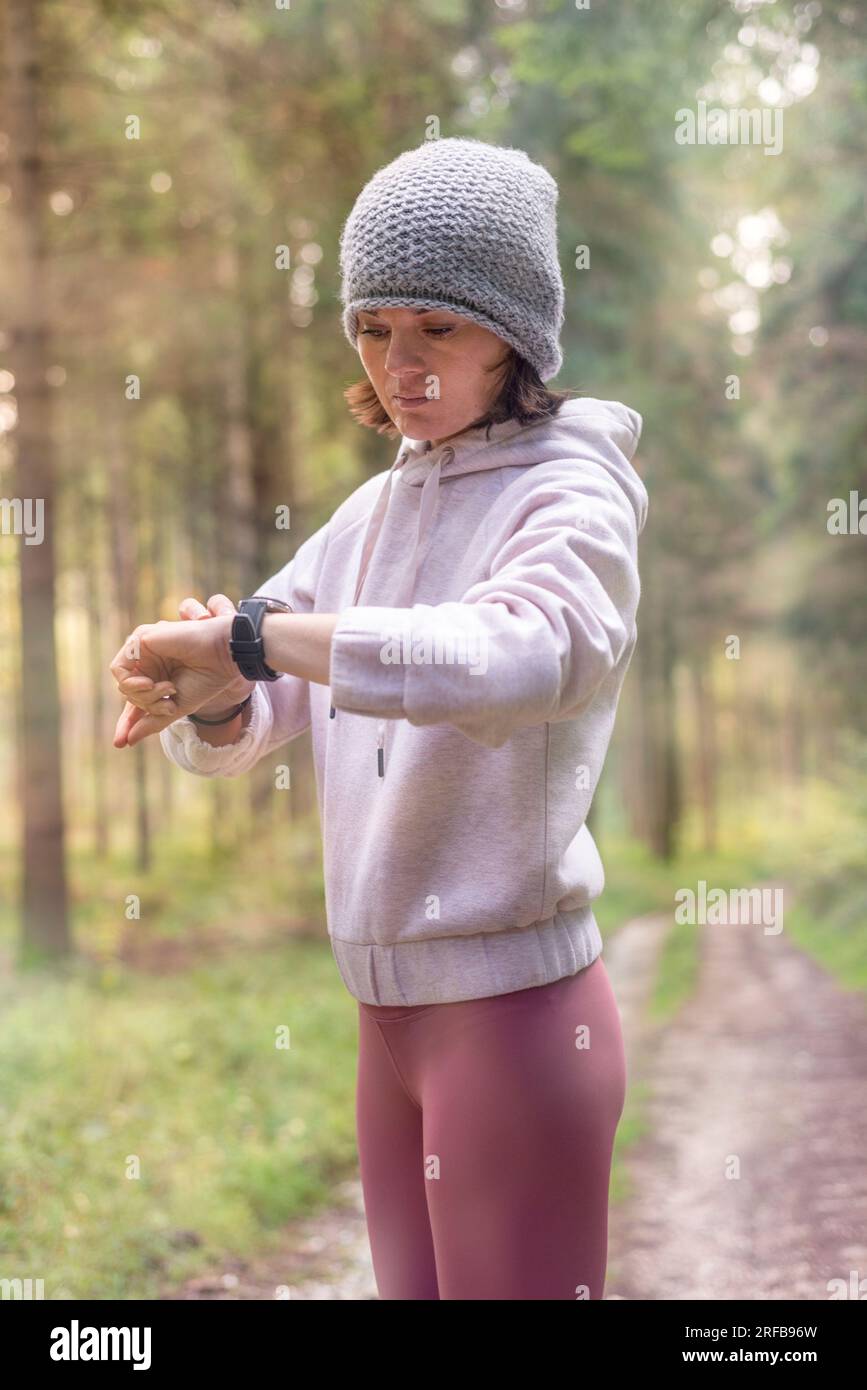 Runner watch forest hi-res stock photography and images - Alamy