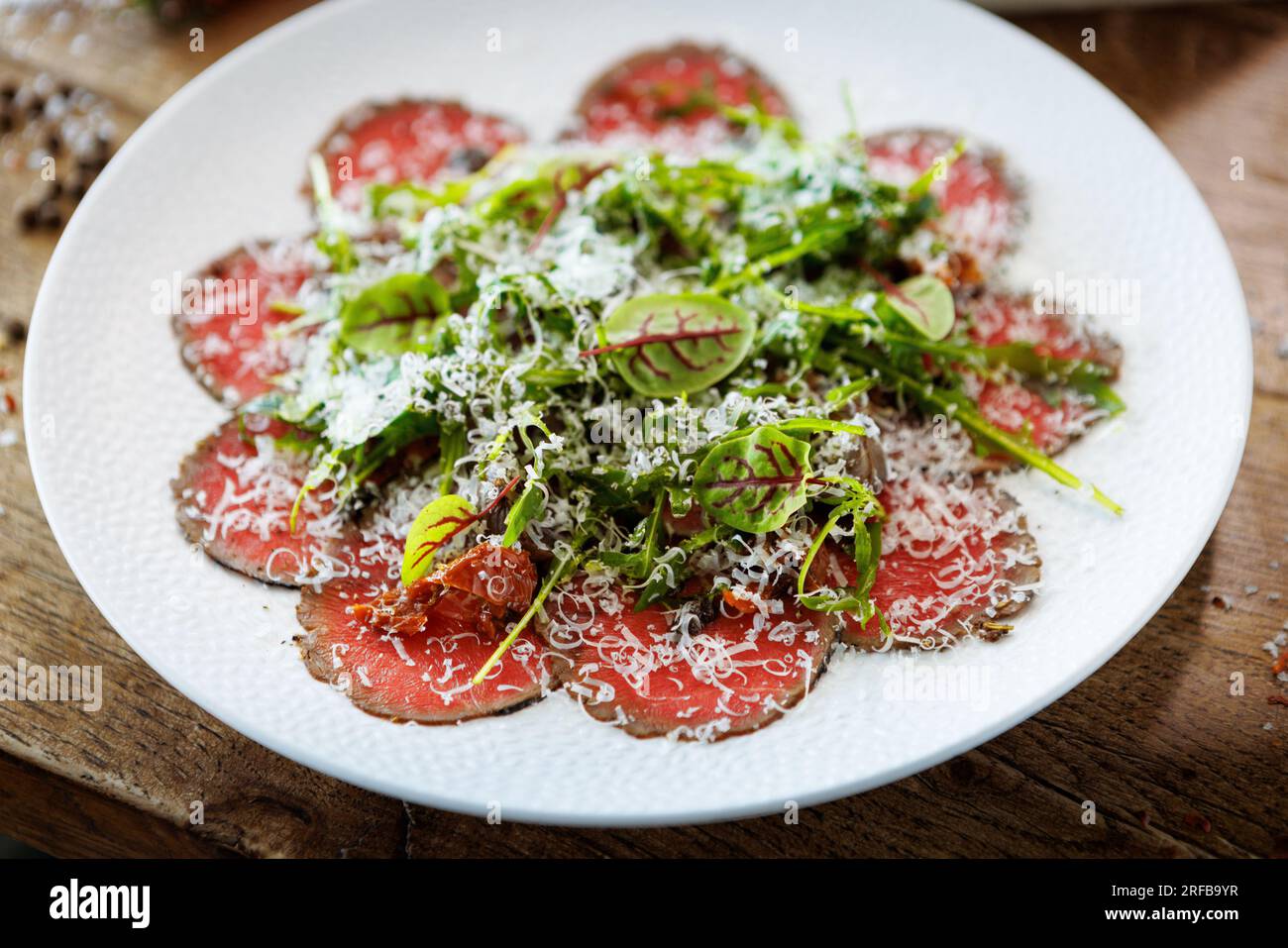 Beef carpaccio. Borettane onion, sun-dried tomato, truffle dressing ...