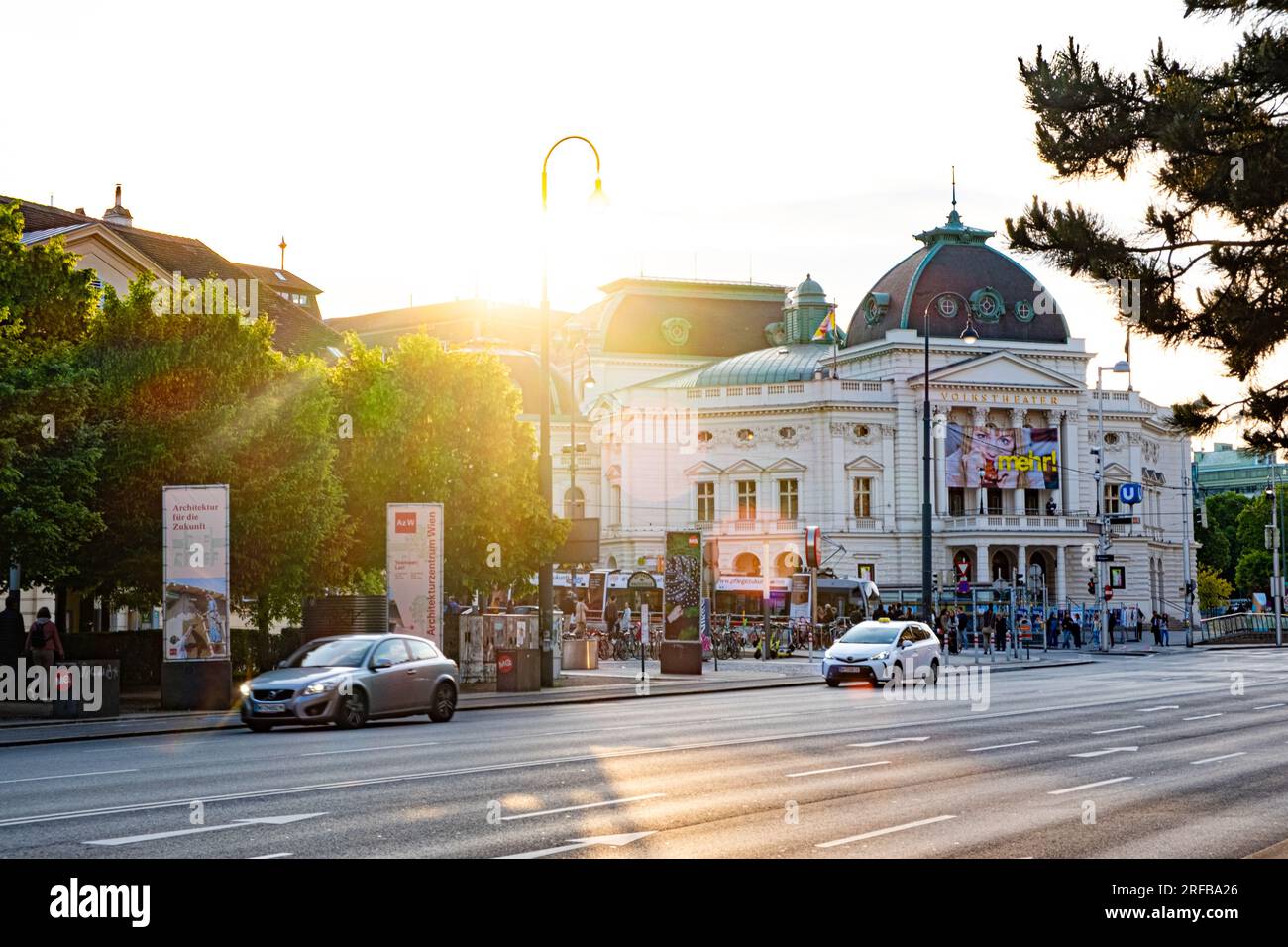 Evening Vienna street, view of the Volkstheater and the road with ...