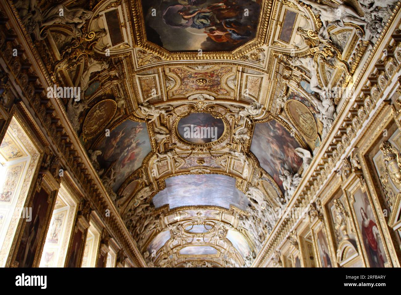 The sumptuous interior of the Louvre museum in Paris, France, stucco ...