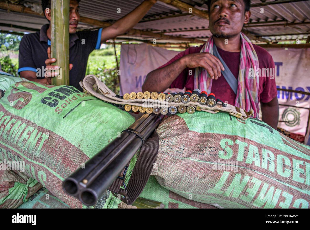 Armed Kuki men guard a village in Churachandpur district in the ...