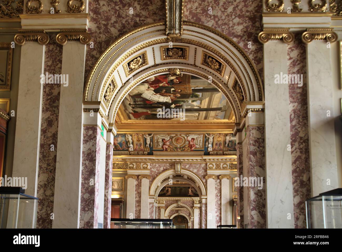 The sumptuous interior of the Louvre museum in Paris, France, stucco ...