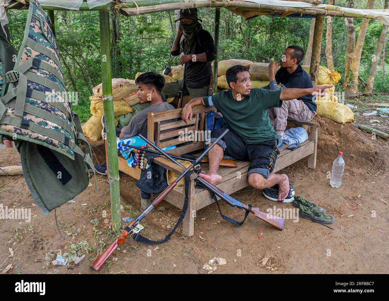 Armed Kuki youths guard Dampi village checkpoint in Churachandpur district in the northeastern ...