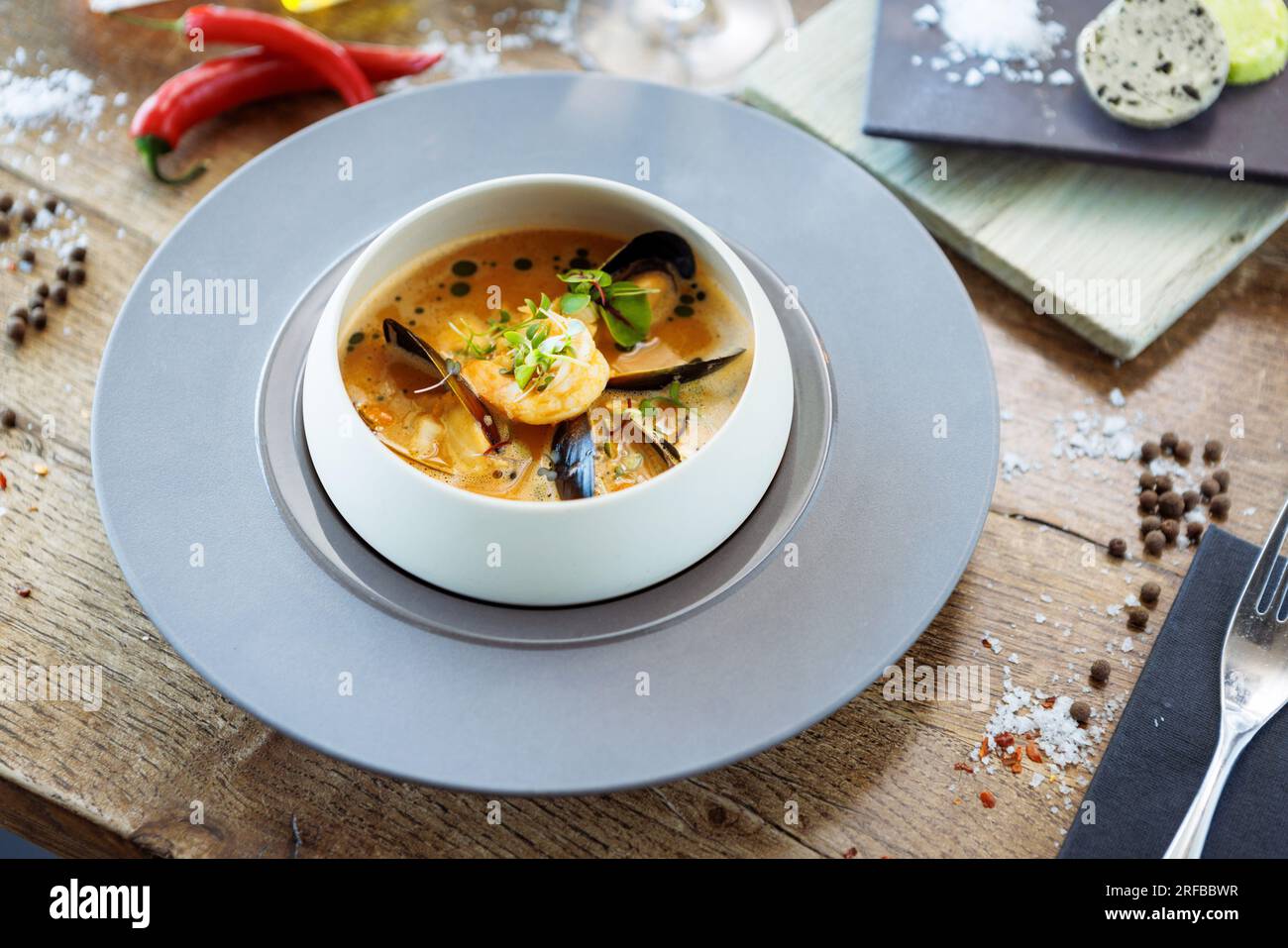 Shrimp Bisque with Seafood. King prawn, blue mussels, cod, whipped ...
