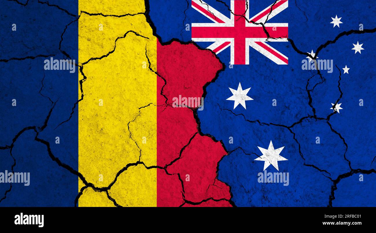 Flags of Chad and Australia on cracked surface - politics, relationship ...