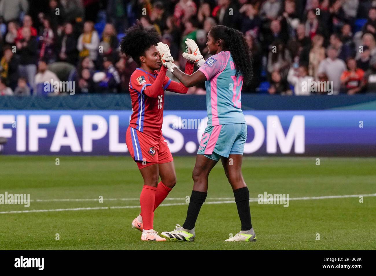 Panama's goalkeeper Yenith Bailey clasps hands with Panama's Rebeca ...