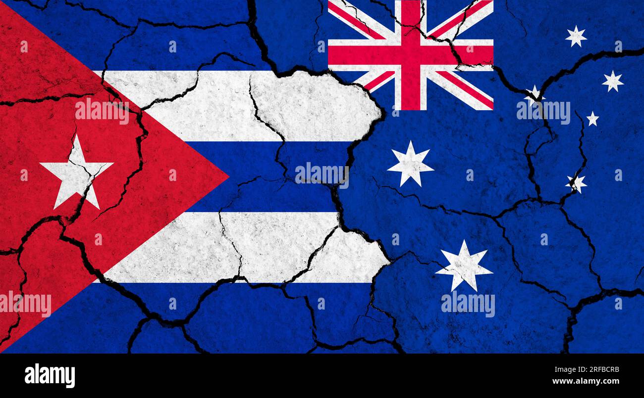 Flags of Cuba and Australia on cracked surface - politics, relationship ...