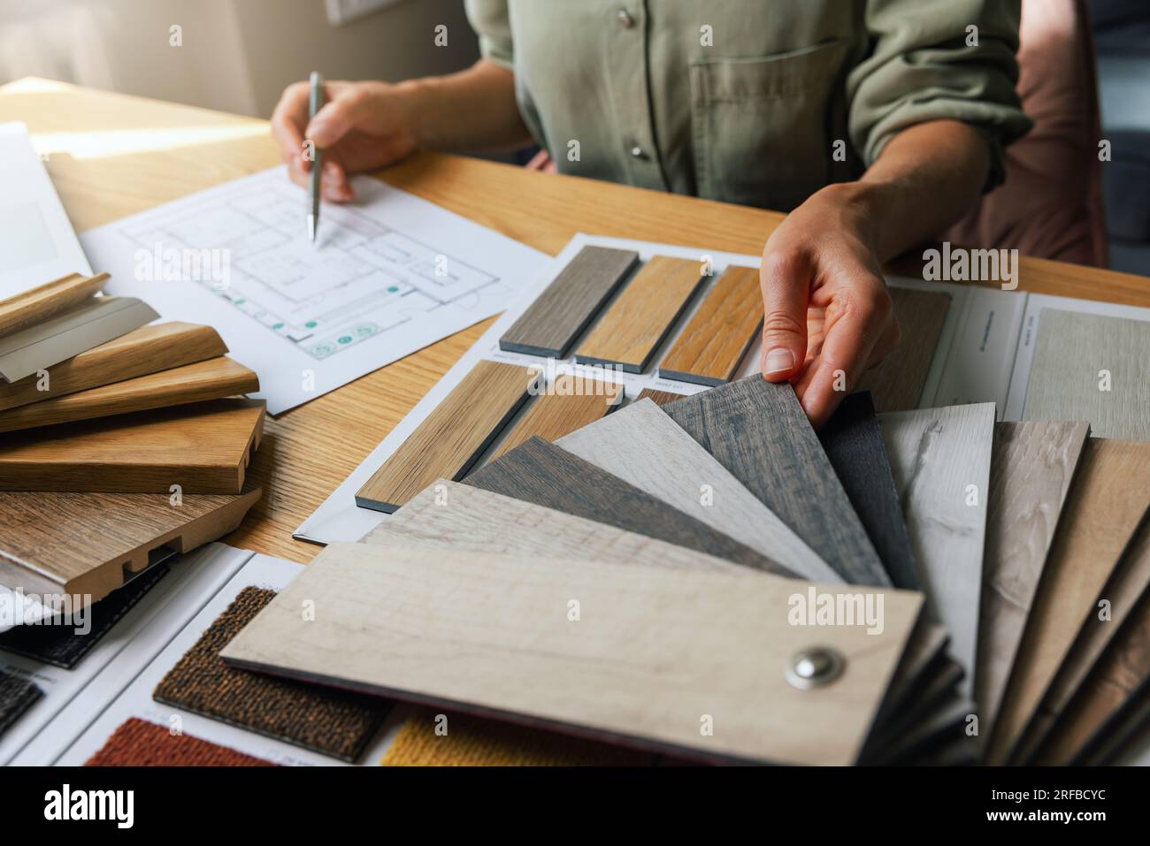 interior designer working on new house design project in office ...