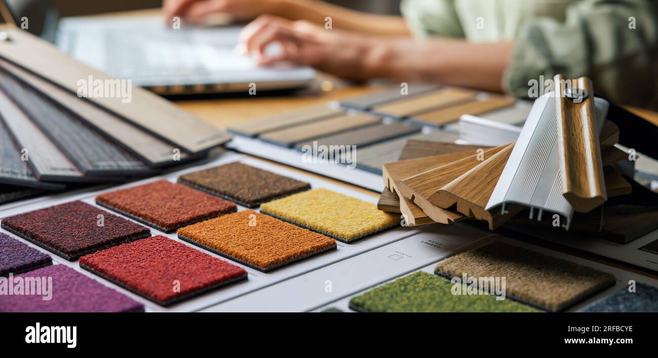 variety of design material samples on designers desk in office. banner ...