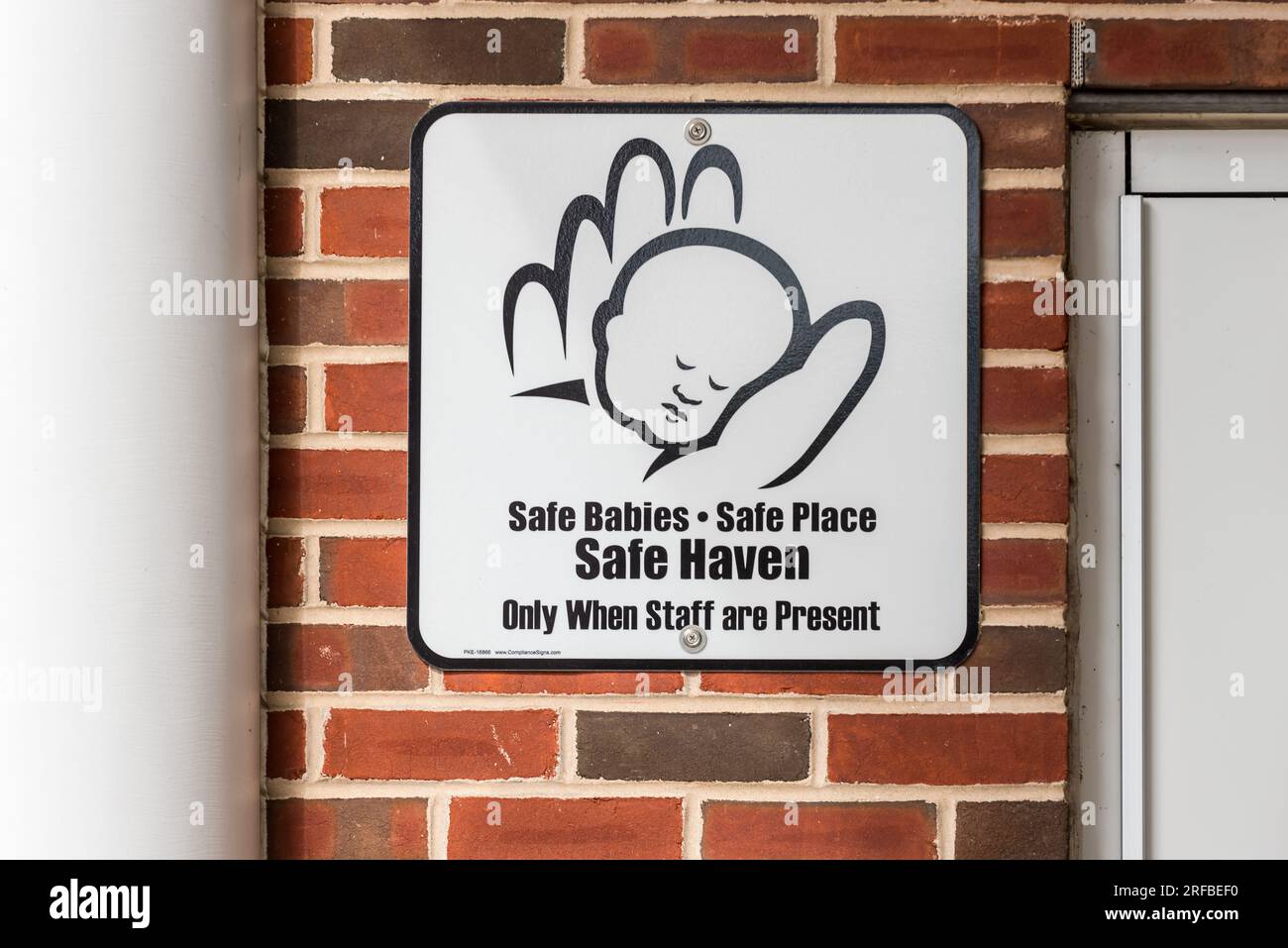Safe Haven sign on Acton Police station wall Stock Photo - Alamy