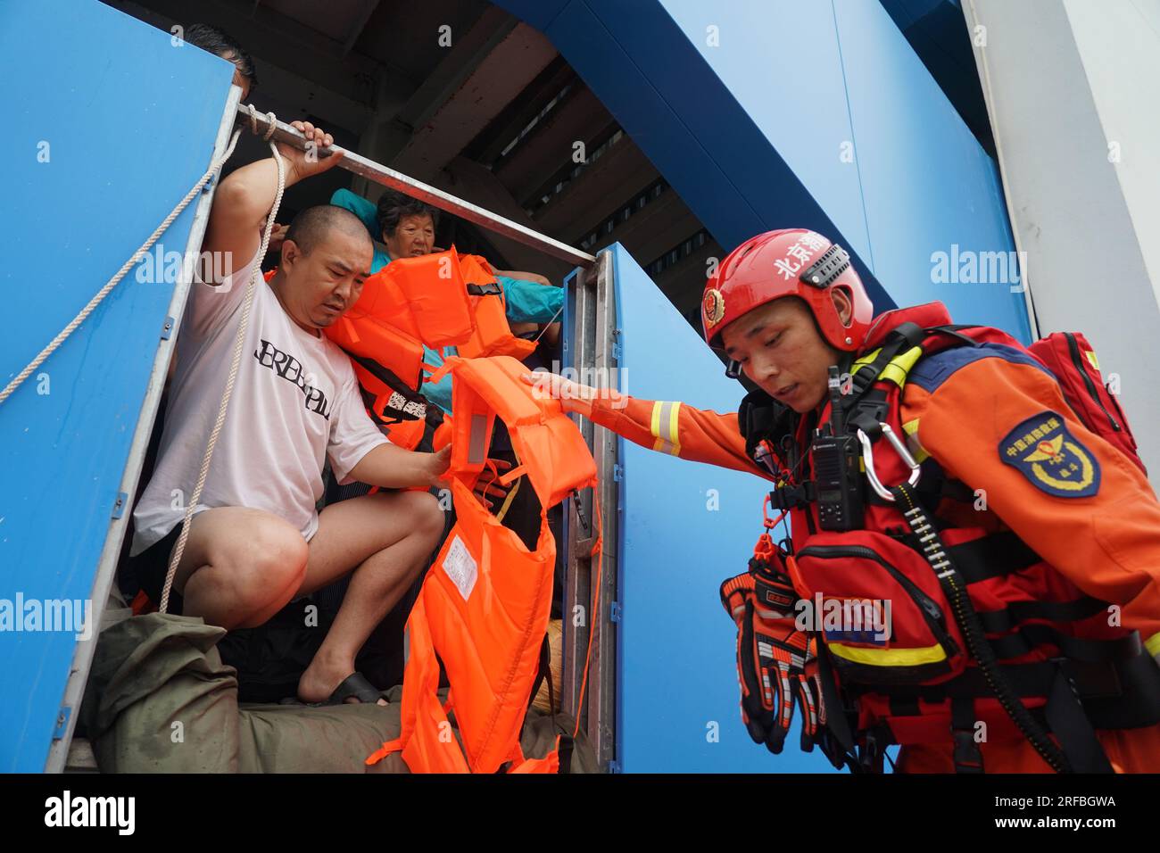 Firefighter rescue flood hi-res stock photography and images - Alamy
