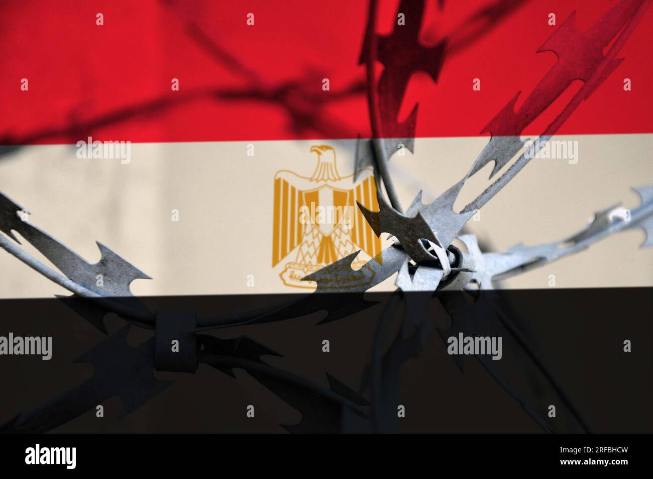 Abstract image of the national flag of Egypt with twisted barbed wire ...