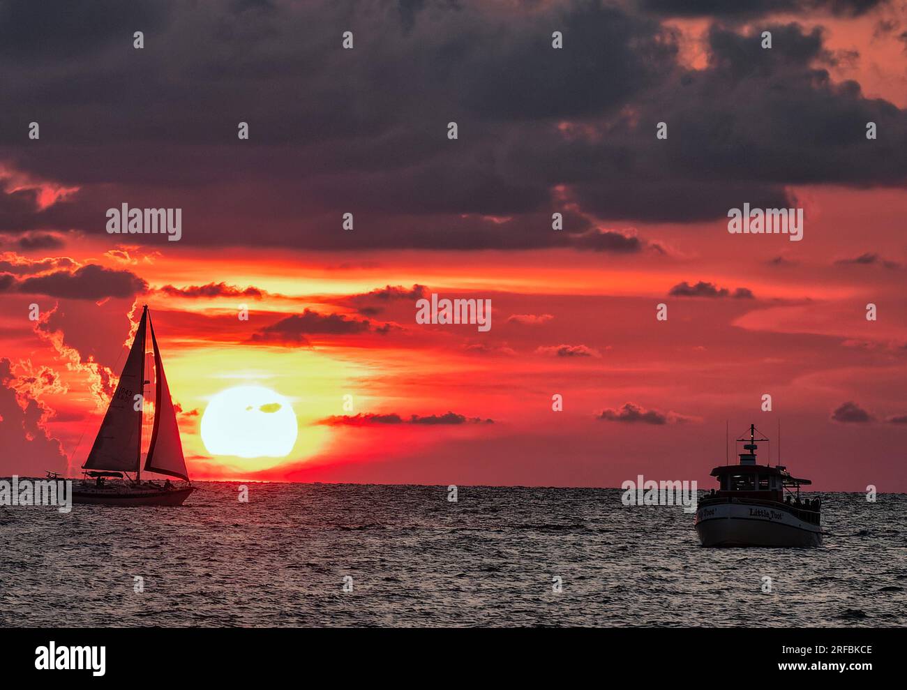 A sunset scene at a beach resort Stock Photo - Alamy