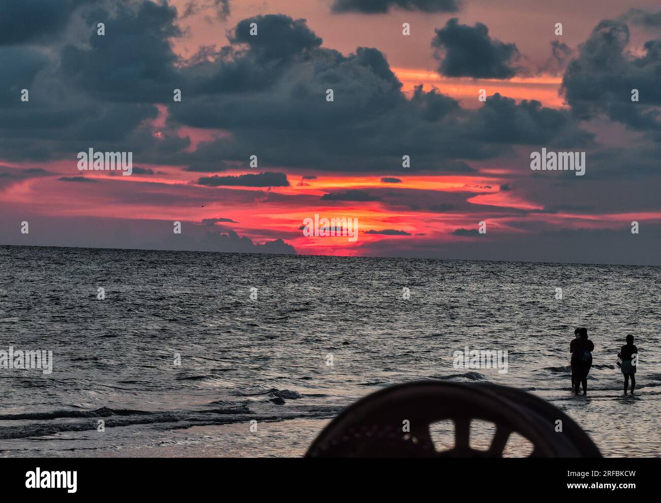 A sunset scene at a beach resort Stock Photo - Alamy