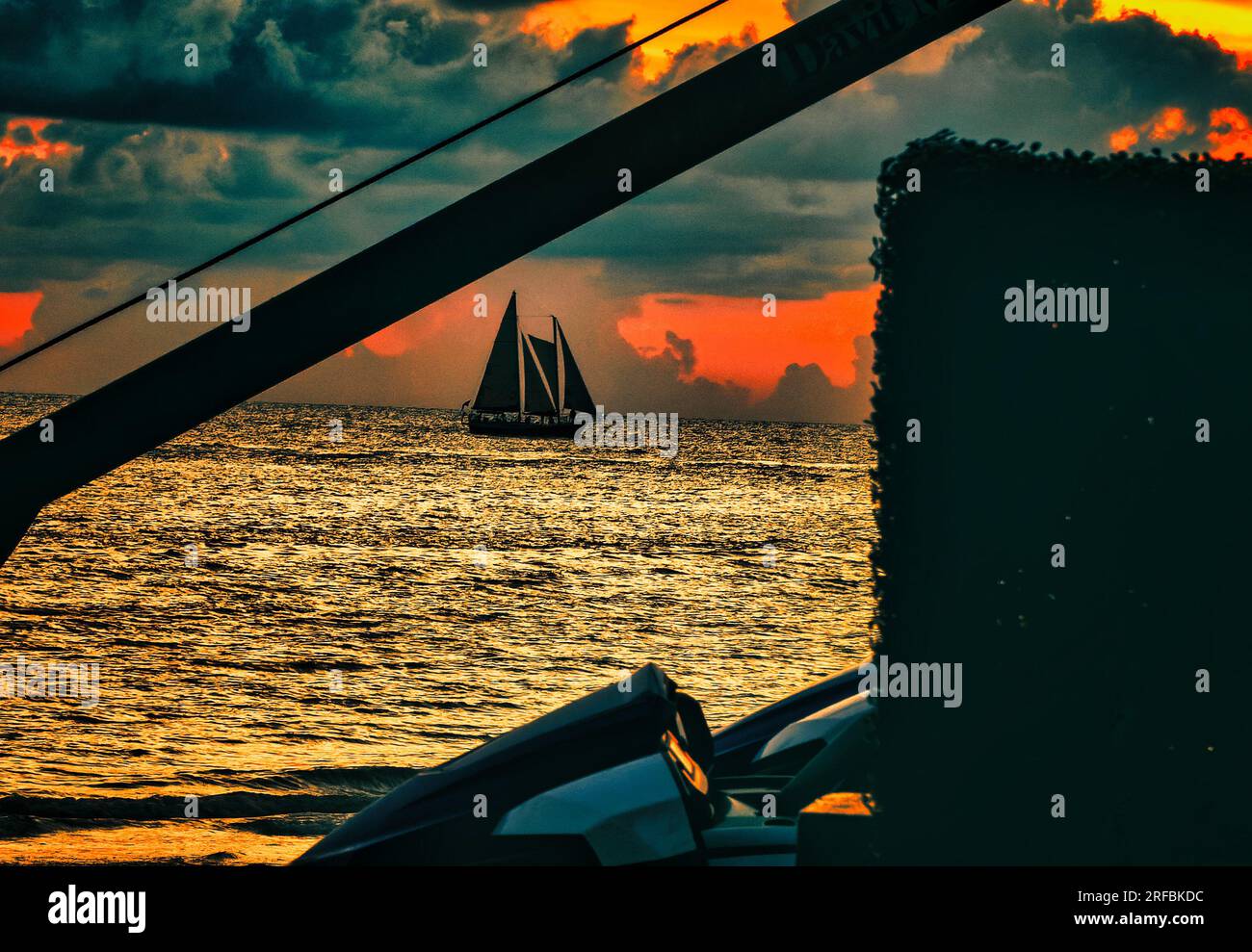 A sunset scene at a beach resort Stock Photo - Alamy