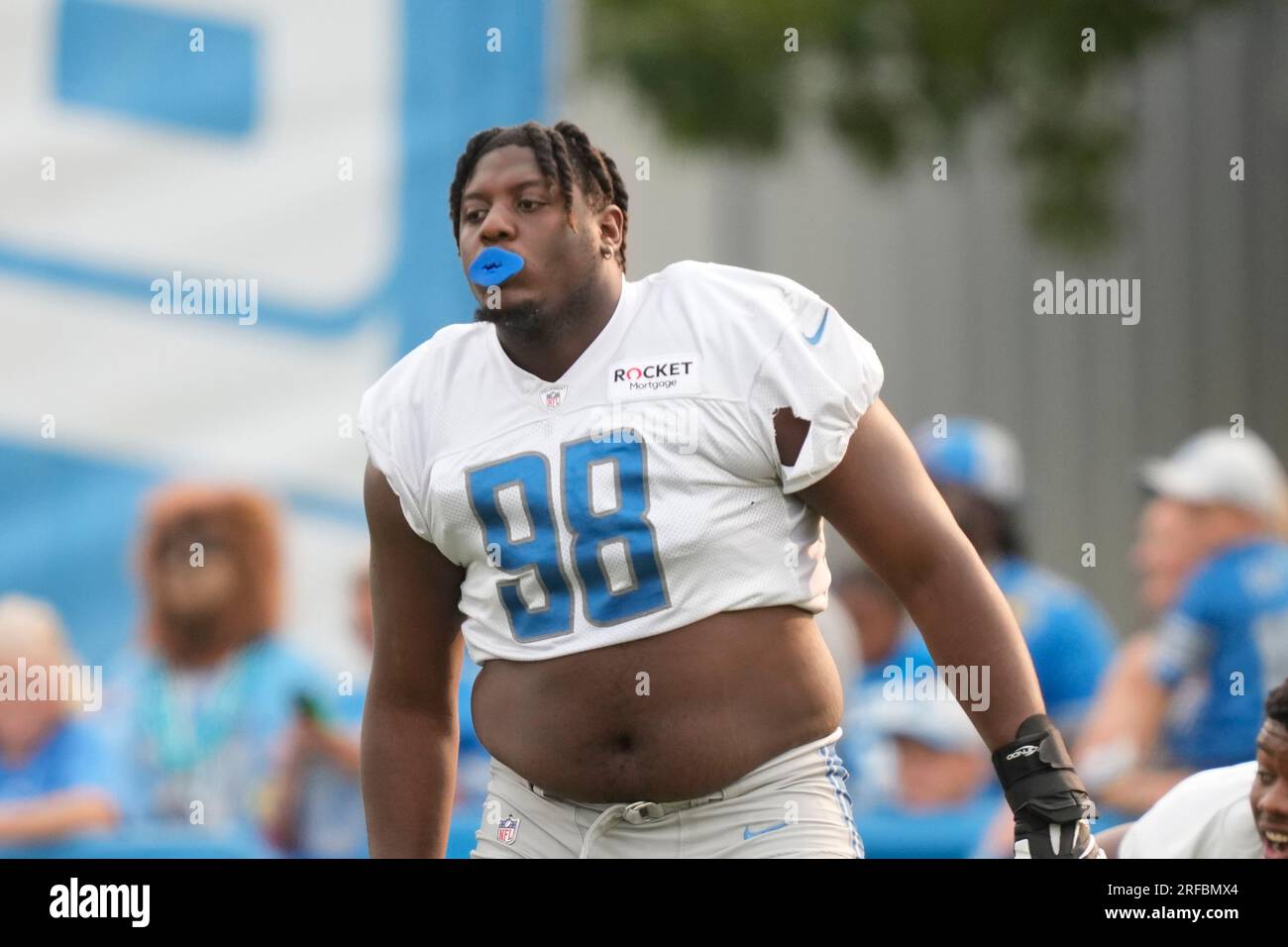 Detroit Lions defensive linemen Brodric Martin, stretches before an NFL ...