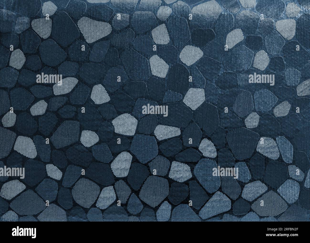 Abstract dark blue background. A sample with shiny particles or cells ...