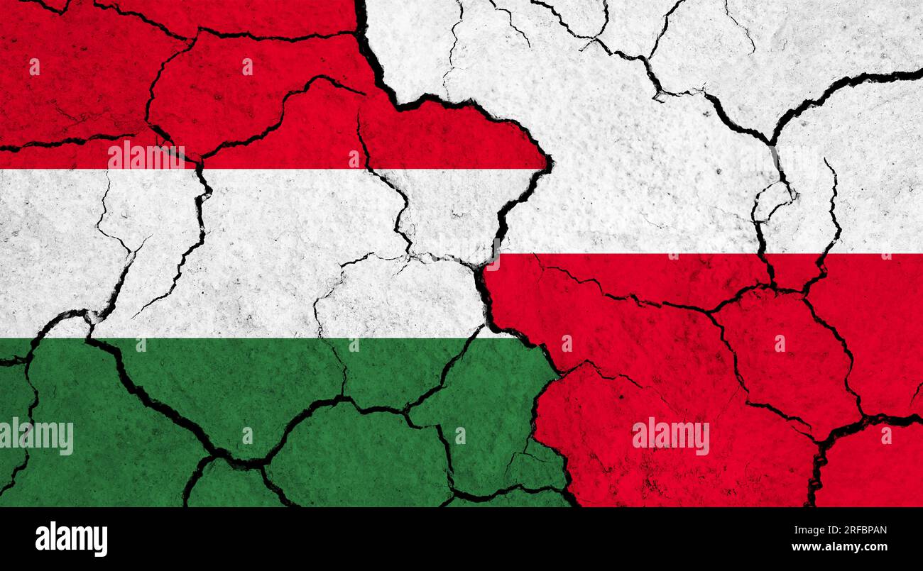 Flags of Hungary and Poland on cracked surface - politics, relationship ...
