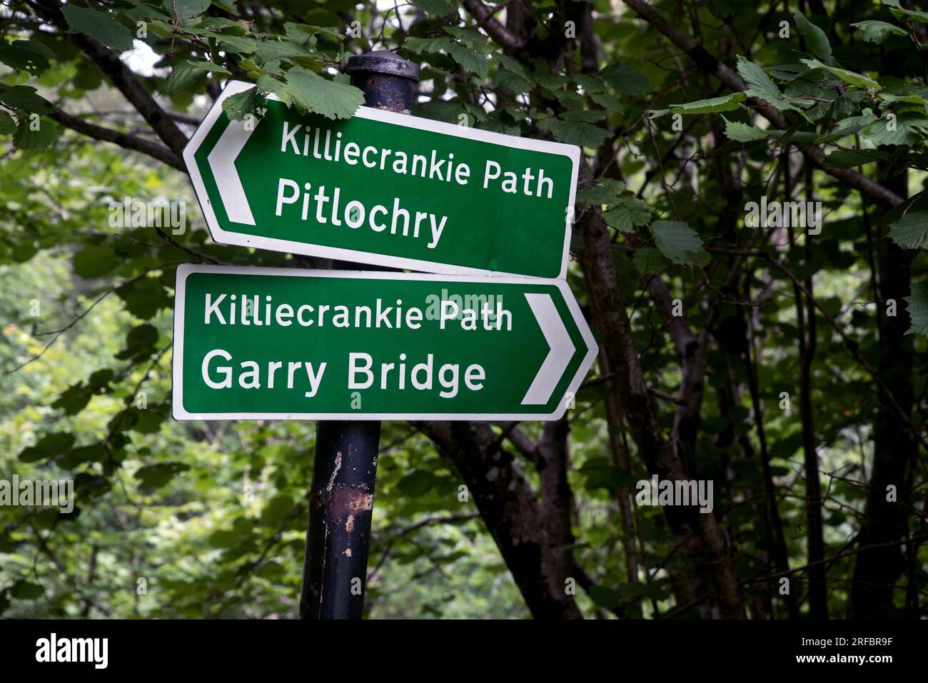 Signpost on the Killiecrankie Path walking trail pointing the way to ...