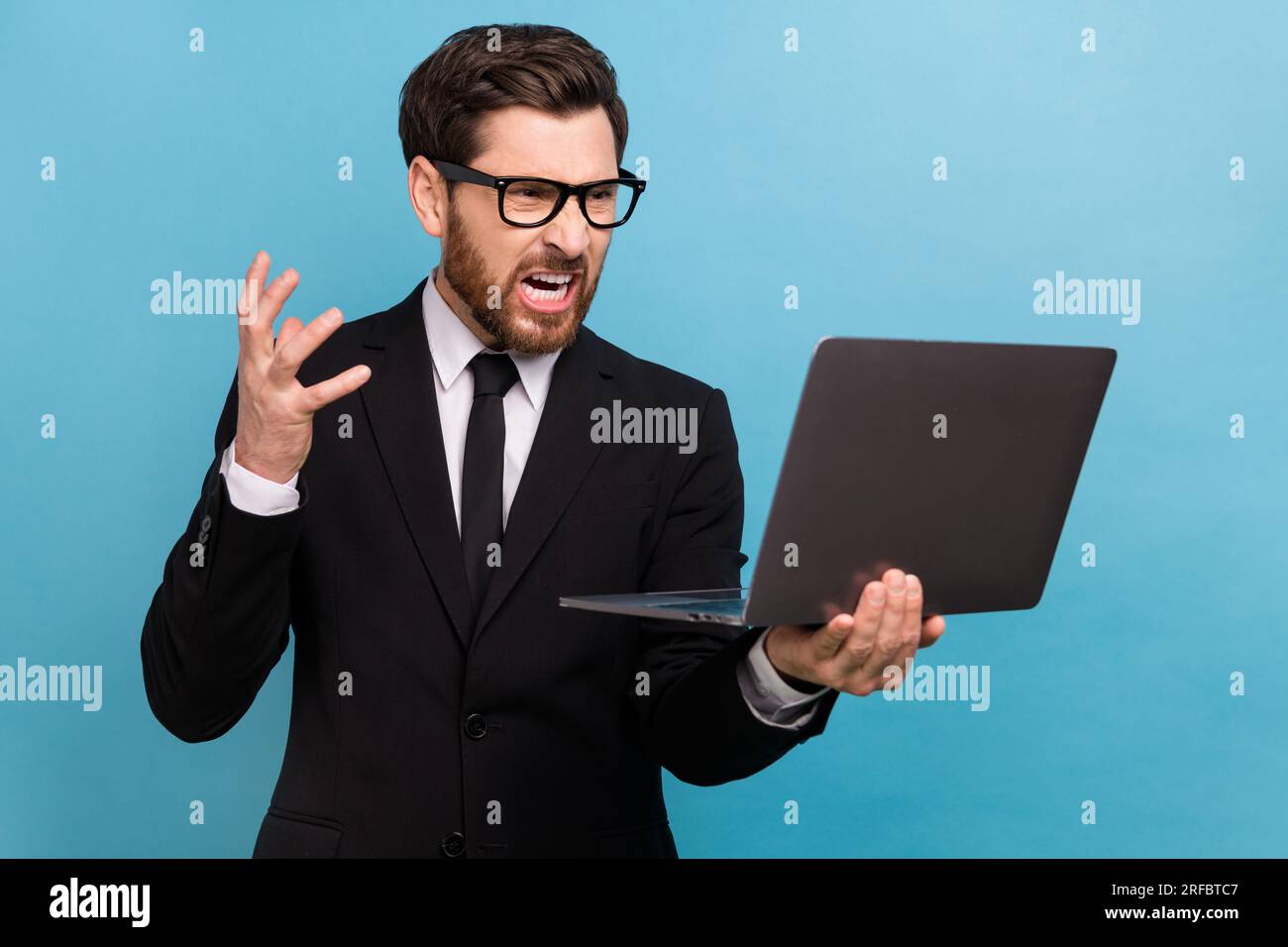 Photo of furious mad ceo dressed black suit eyewear reading emails ...