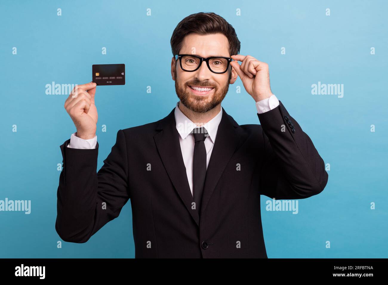 Photo of smart clever agent dressed black suit eyewear showing bank ...
