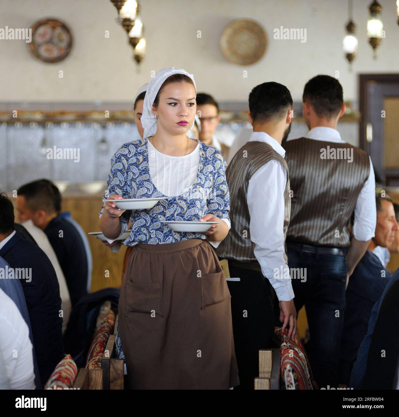 At Crimean Tartar restaurant: waitress in Tartar native dress going ...