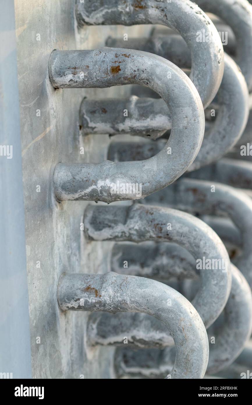 water end flow coil tubes from a large air conditioner close up ...