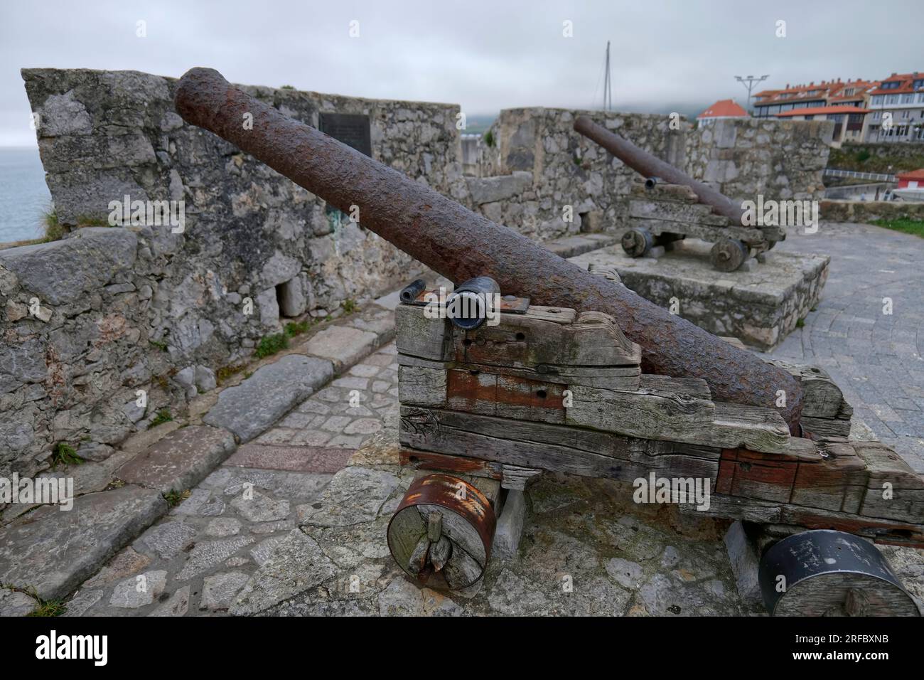 historic old cannons on the sea wall, Llanes,Asturias, Costa Verde ...