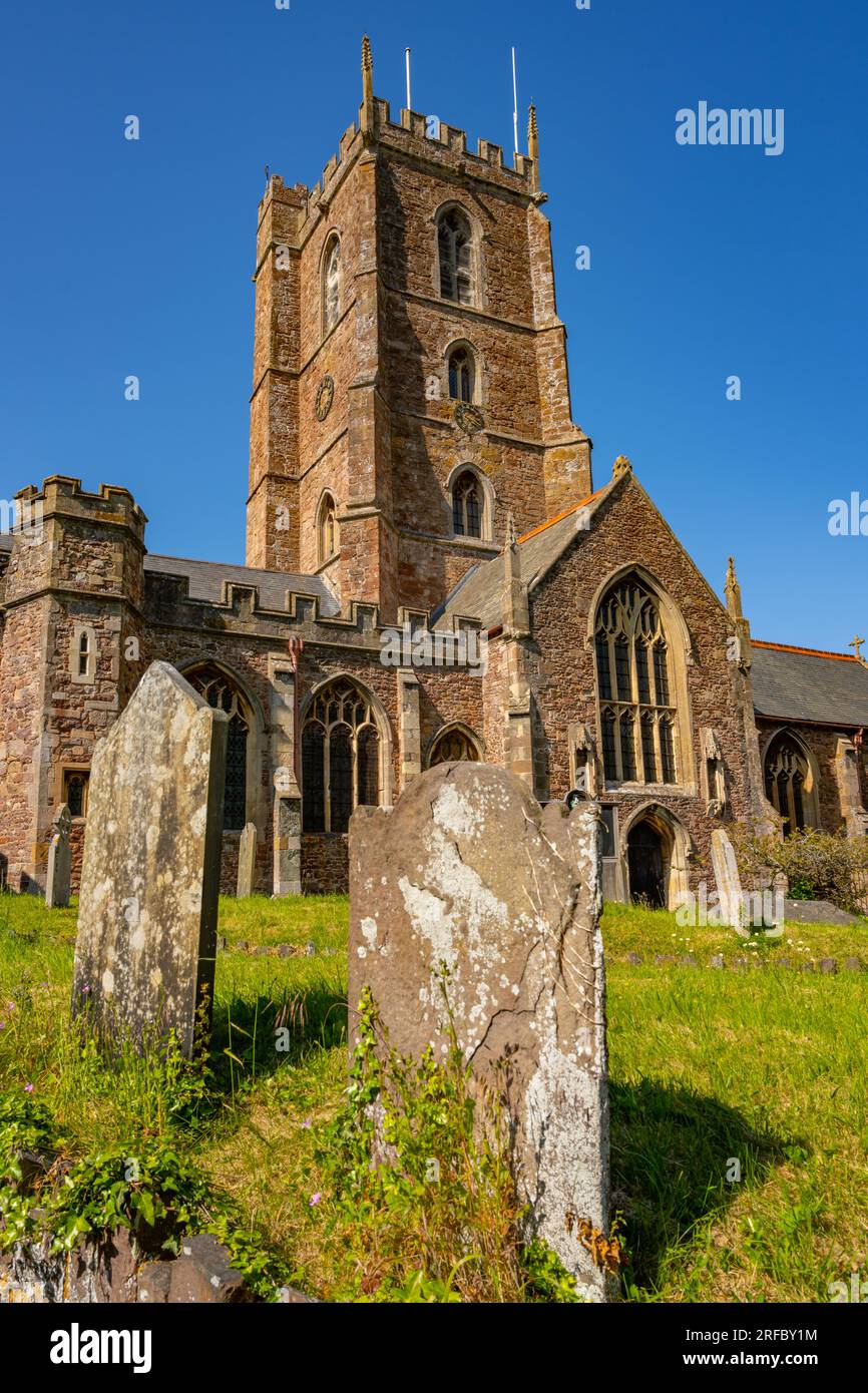 The tower and churchyard of St Georges church Dunster, Somerset Stock ...