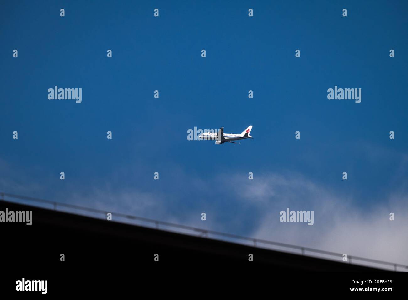 Clear sky China International Flight A320-300 airplane Stock Photo - Alamy
