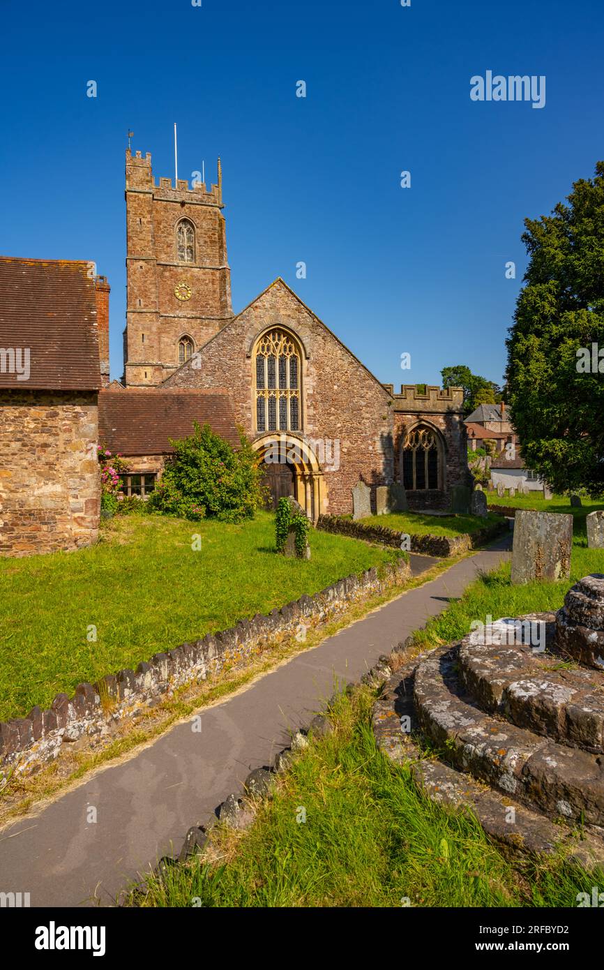 The tower and churchyard of St Georges church Dunster, Somerset Stock ...