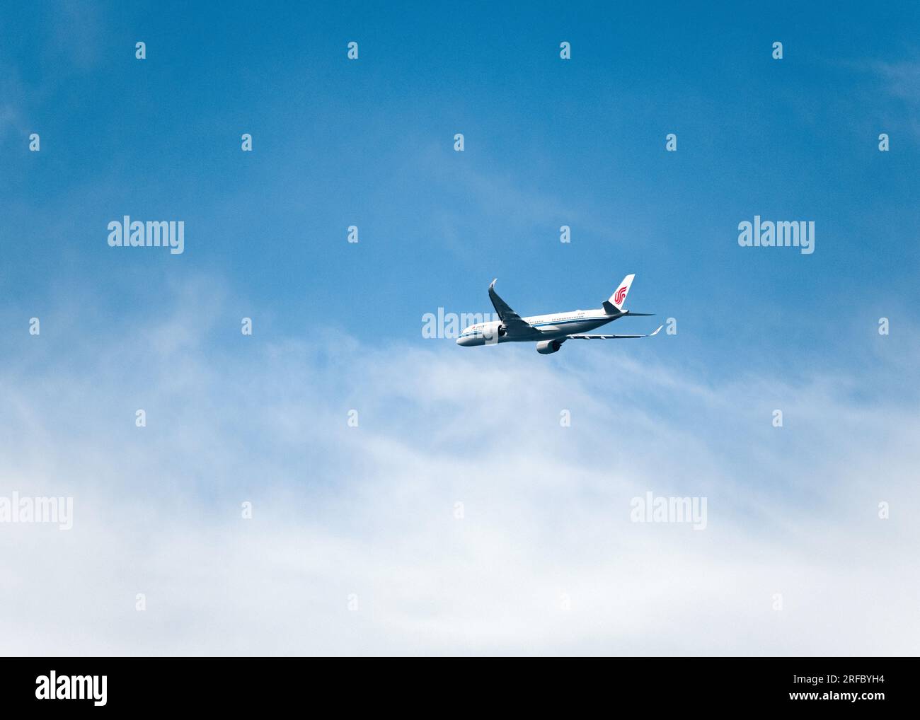 Clear sky China International Flight A320-300 airplane Stock Photo - Alamy