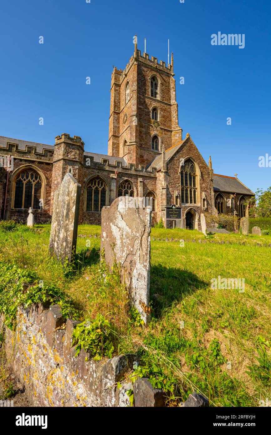 The tower and churchyard of St Georges church Dunster, Somerset Stock ...