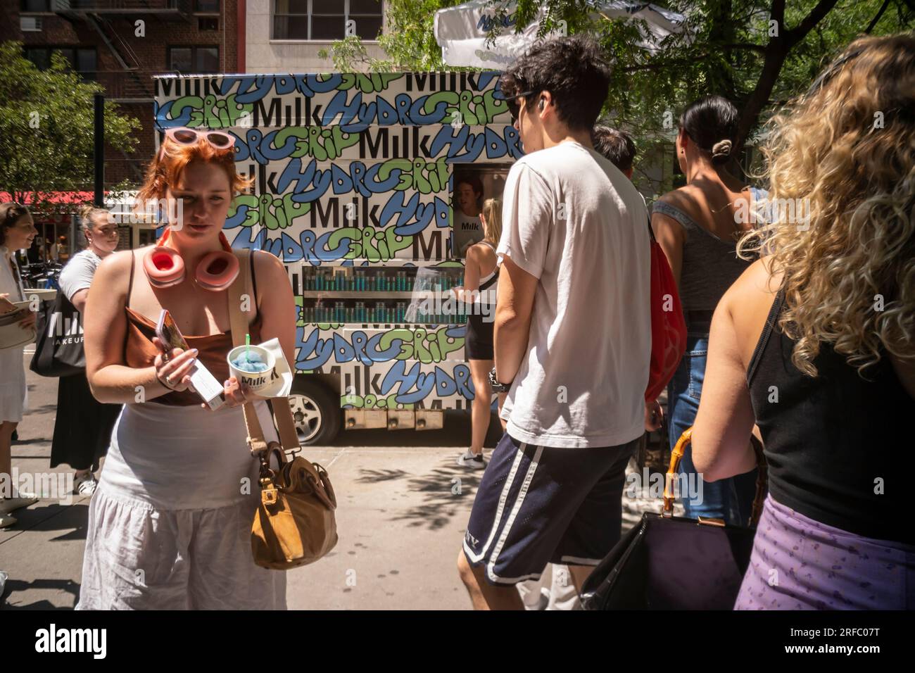 The hot weather doesnÕt deter visitors at the Milk Hydro Grip brand ...