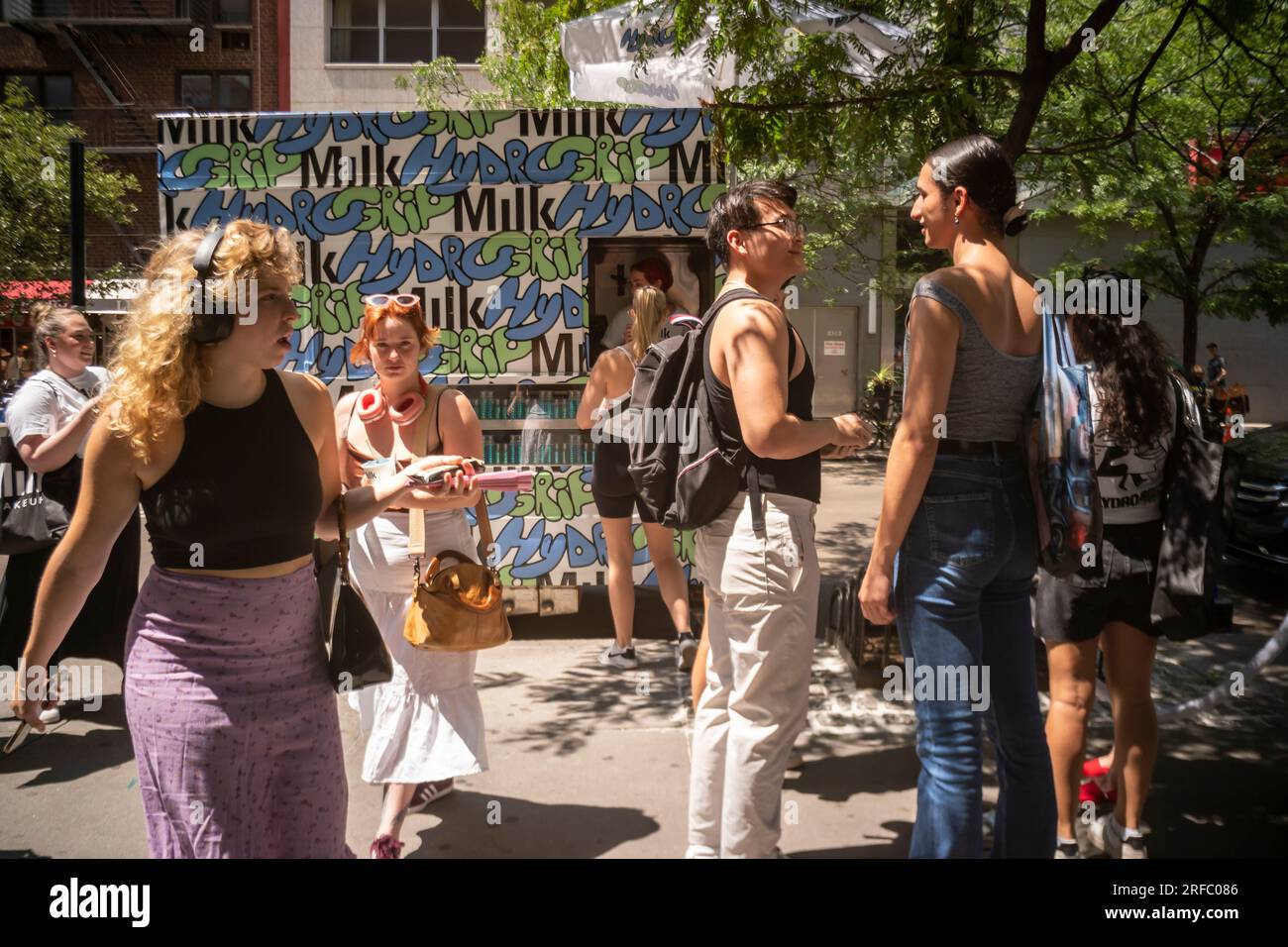 The hot weather doesnÕt deter visitors at the Milk Hydro Grip brand ...