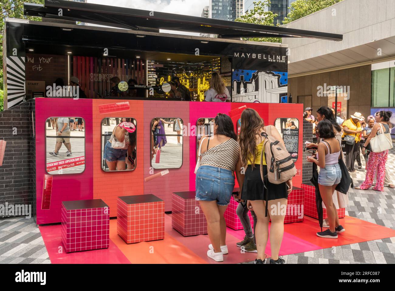 Visitors brave the hot weather to celebrate National Lipstick Day at a ...
