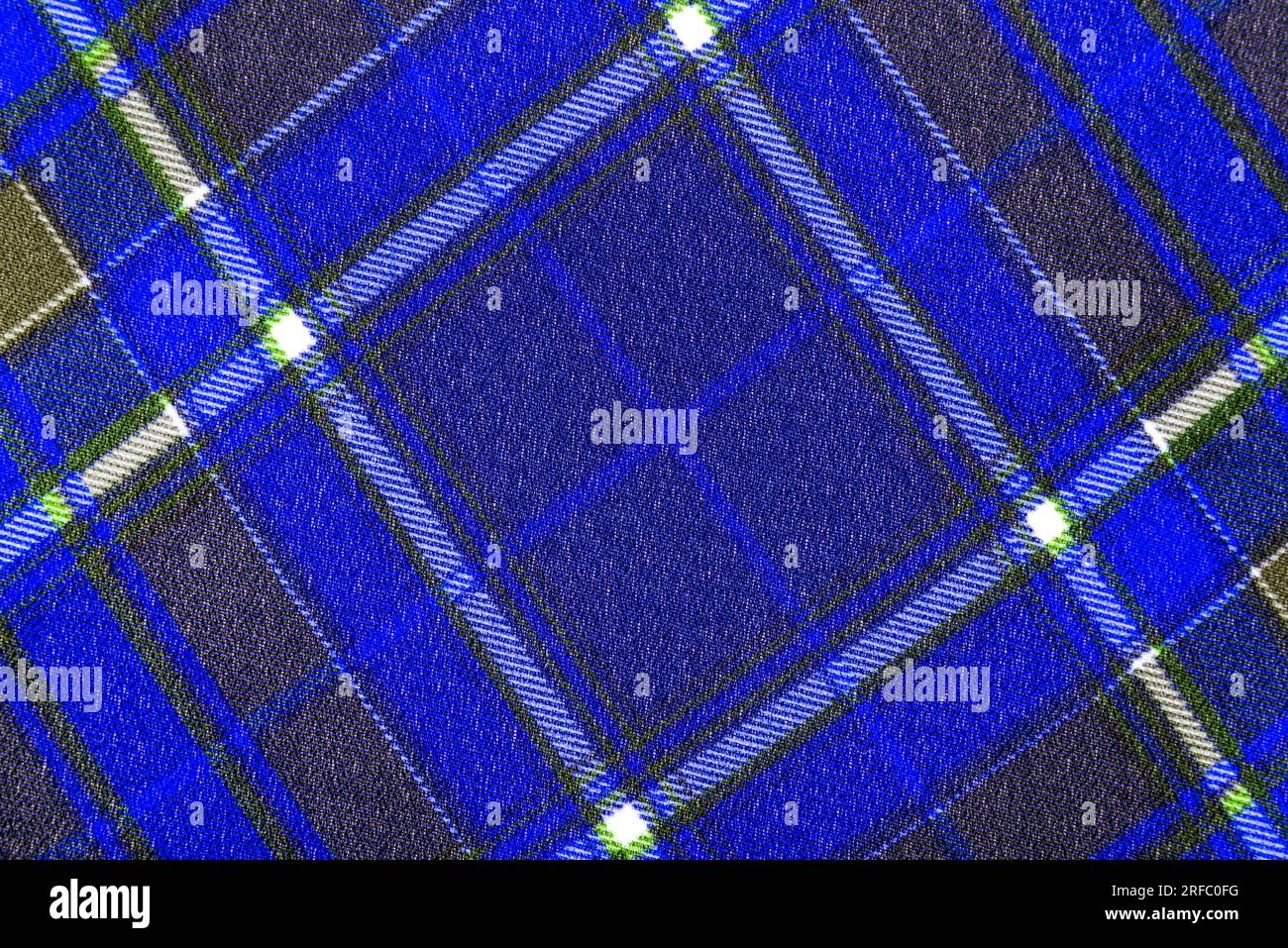 The texture of linen fabric in a large cell of blue and white. Scottish ...