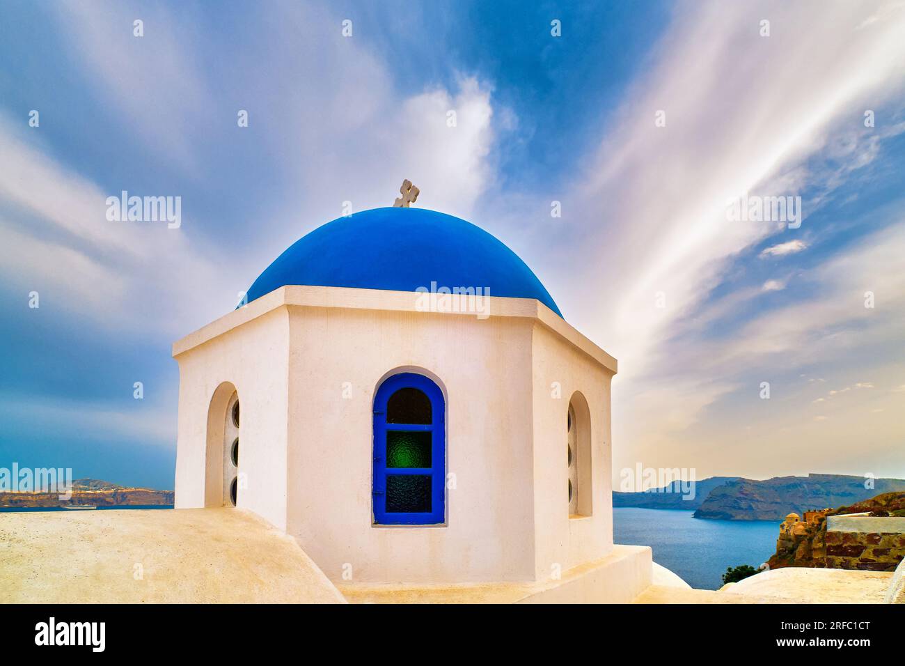 White Greek church and blue dome close-up, blue sky and clouds, Greece ...