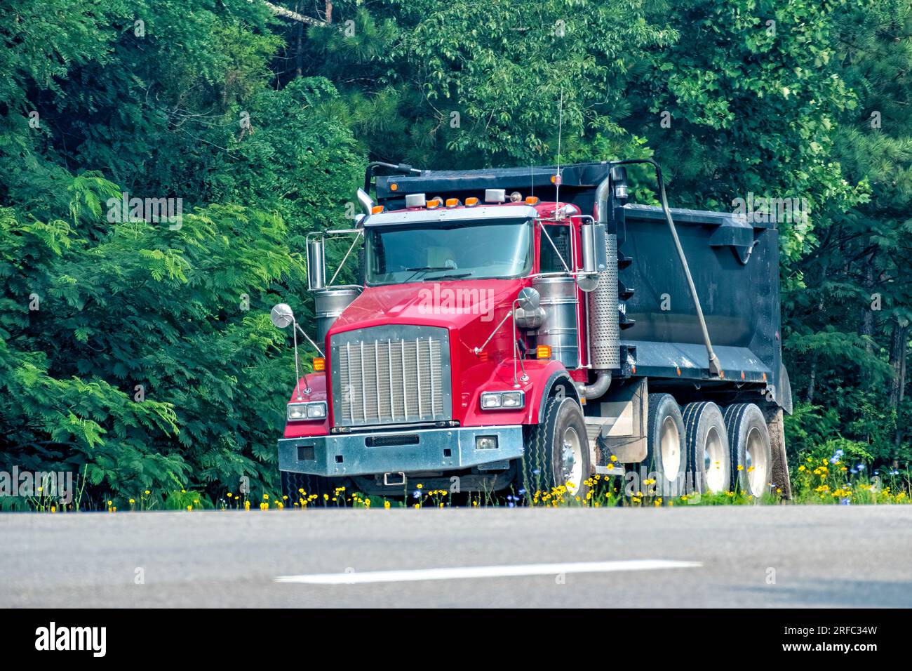 Side dump truck hi-res stock photography and images - Alamy