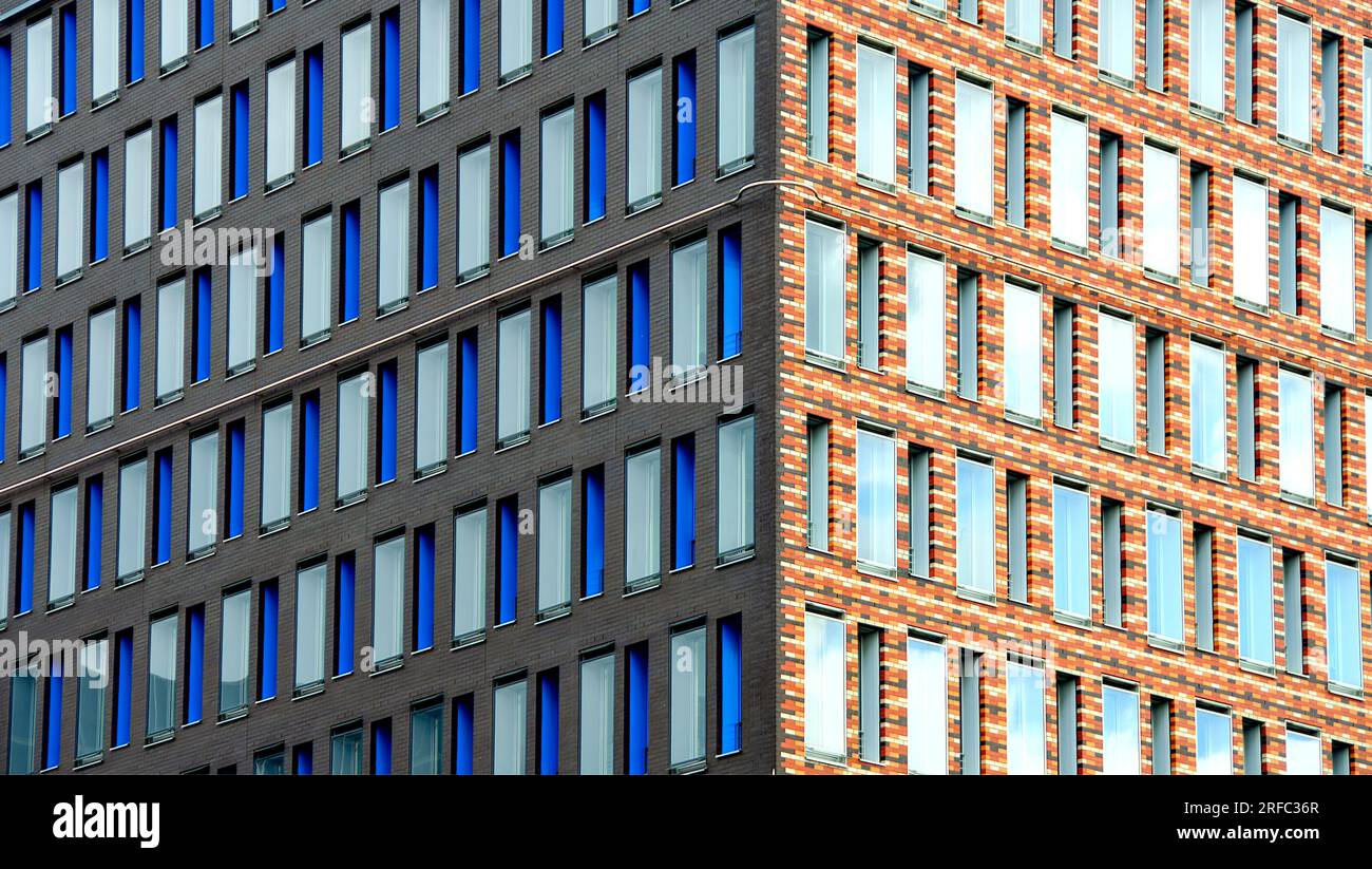 two modern facades with different colours and patterns at the corner of ...
