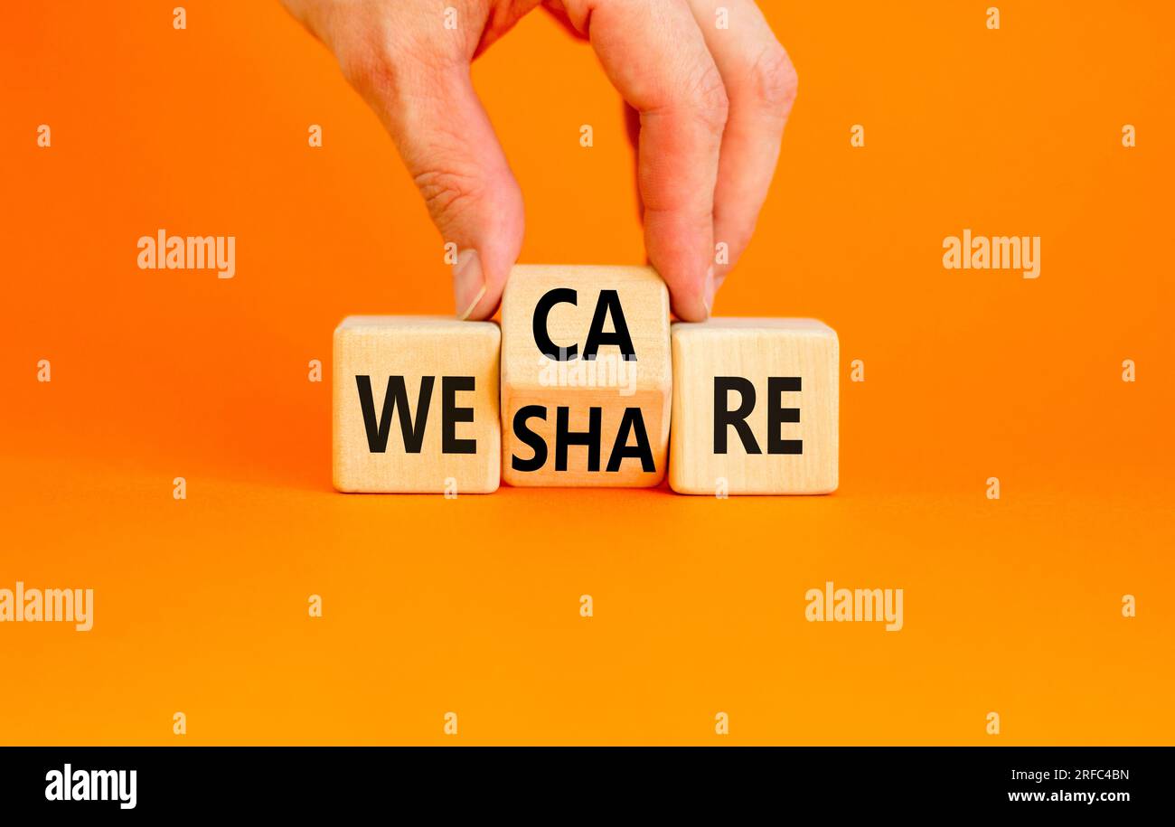 We share and care symbol. Concept word we share we care on wooden block ...