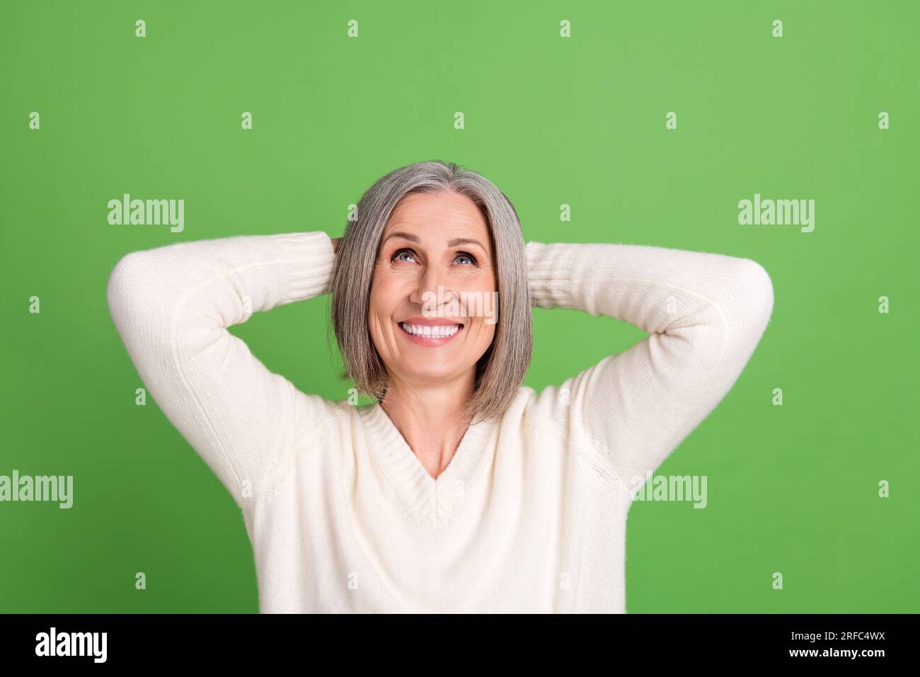 Portrait of old woman hands head take nap looking empty space up ...