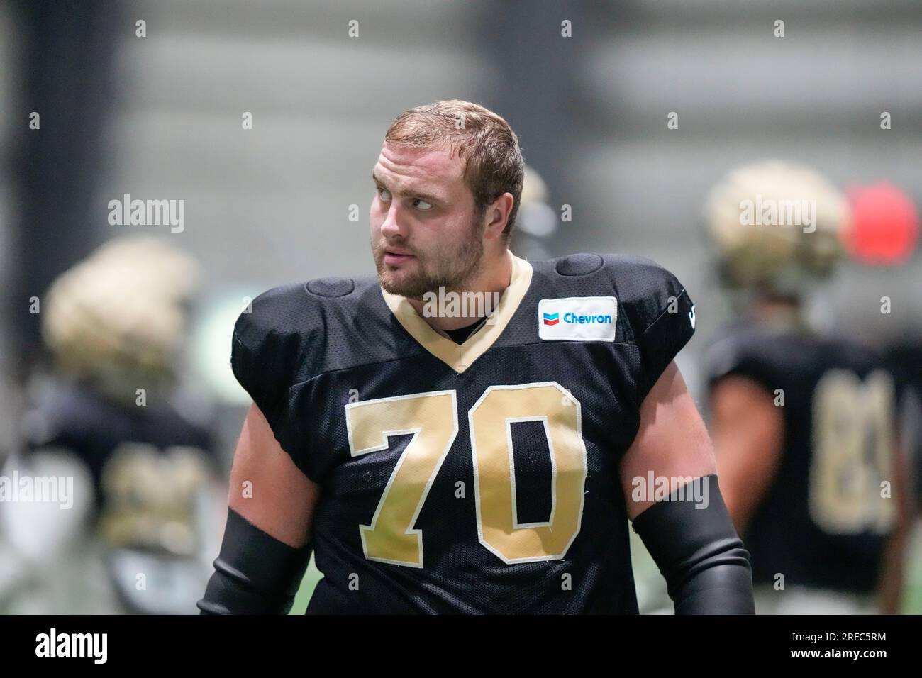 New Orleans Saints offensive tackle Trevor Penning (70) warms up at the ...