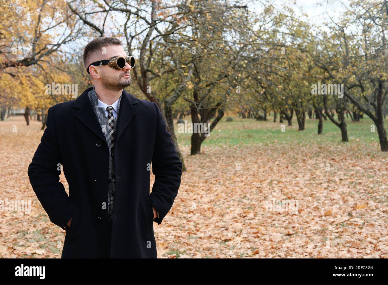 Mysterious guy suit hi-res stock photography and images - Alamy