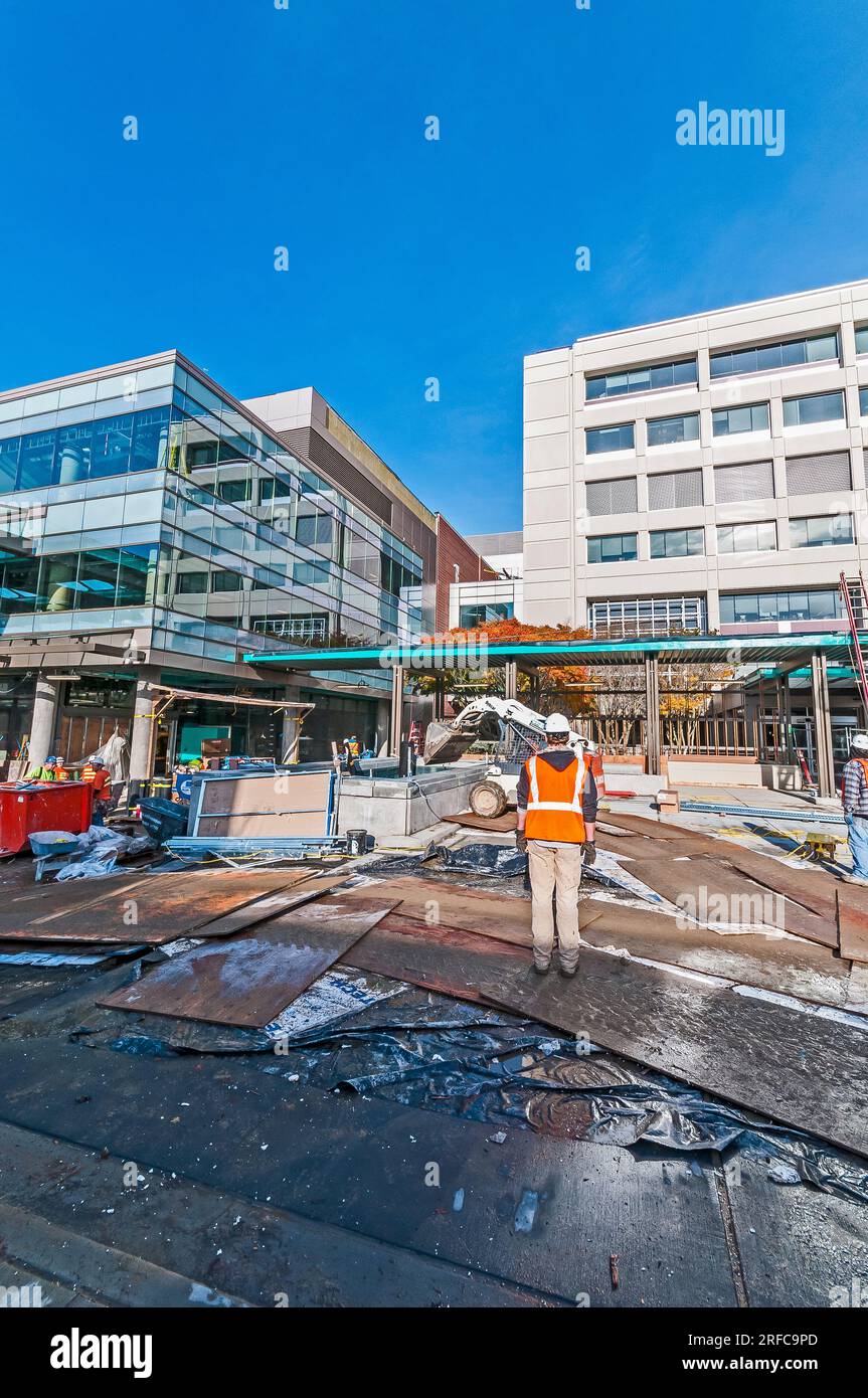 Construction workers at a building project construction site for a ...