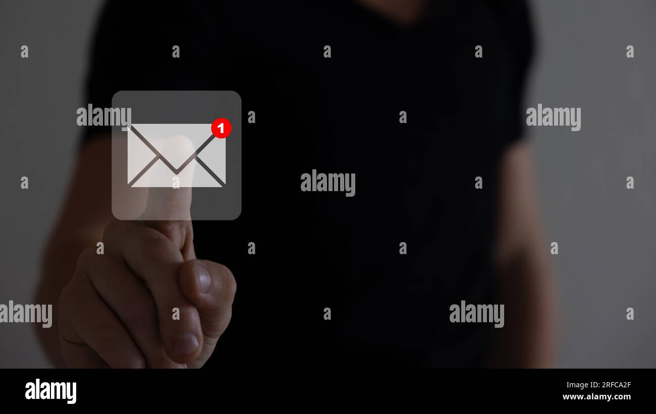 Businessman pressing messaging type of modern icons with virtual ...