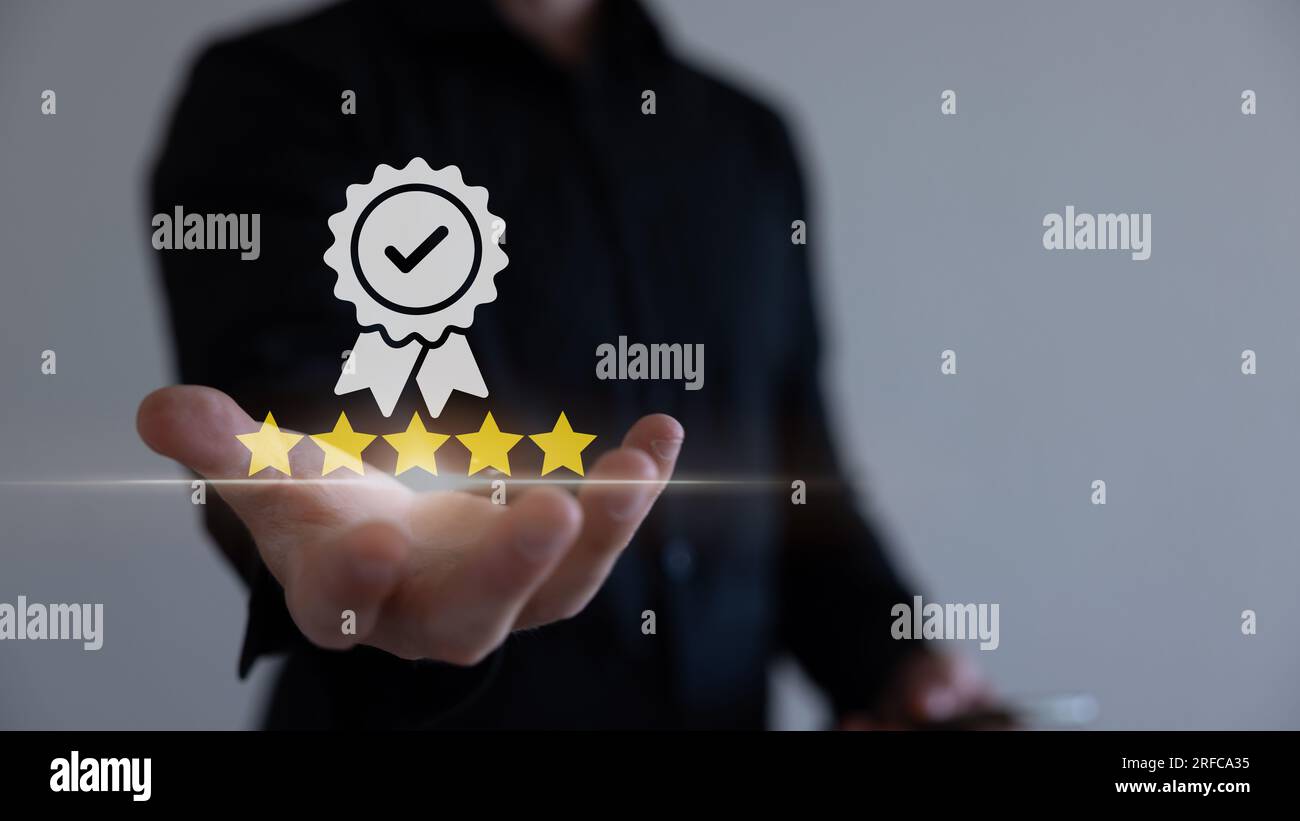 Businessman Hand shows the sign of the top service the best Quality ...