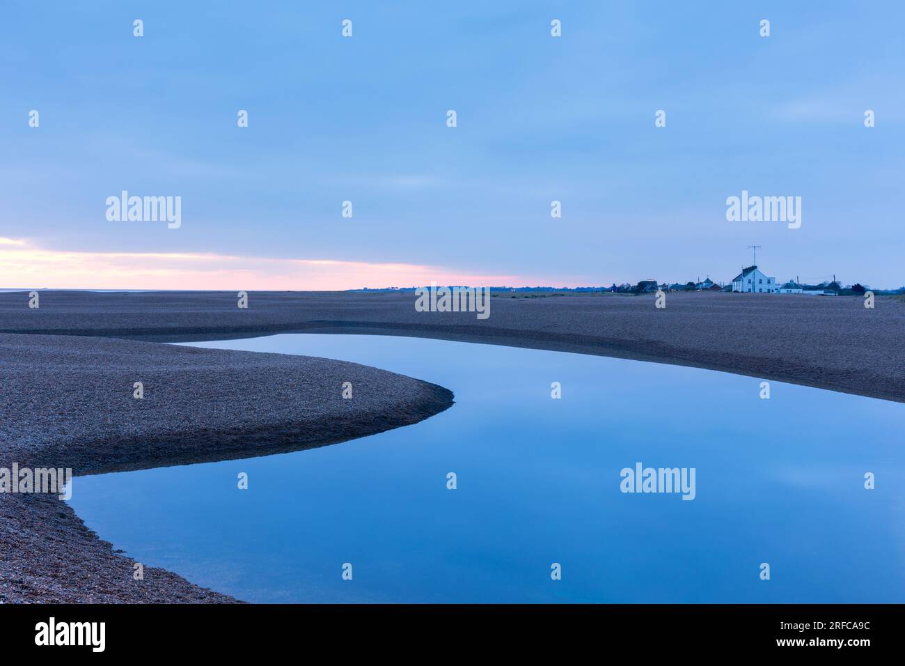 Tidal pools in the beach at Shingle Street Suffolk Stock Photo - Alamy