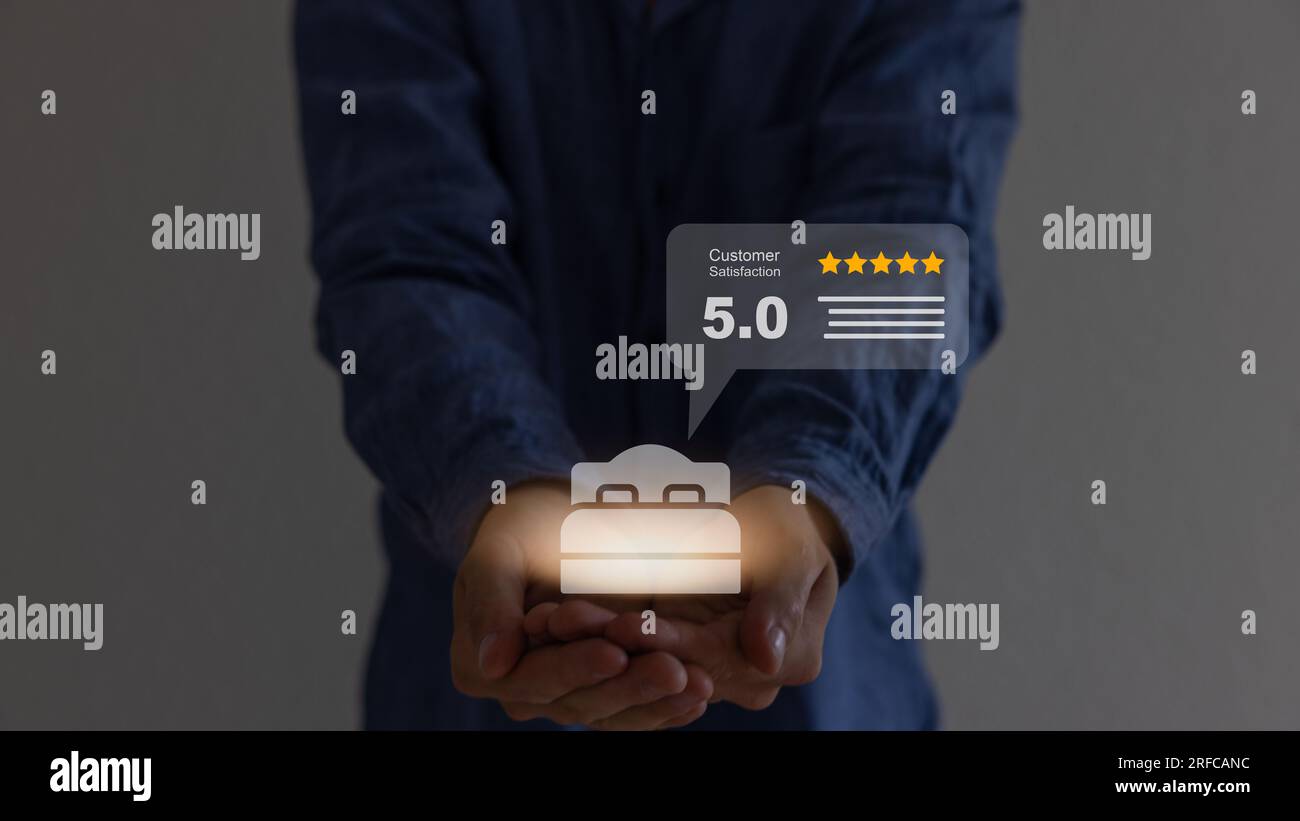 User gives rating to hotel service experience on online application, Customer review ...